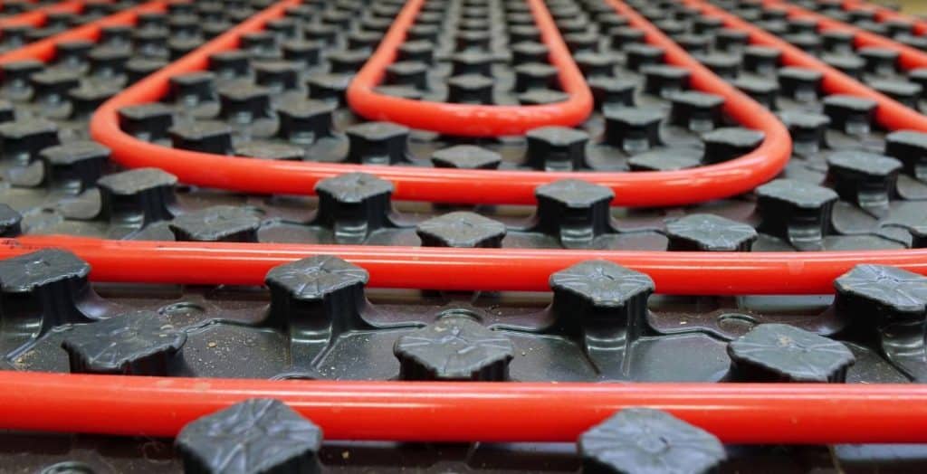 Installing Heated Driveway System | Eden Lawn Care and Snow Removal